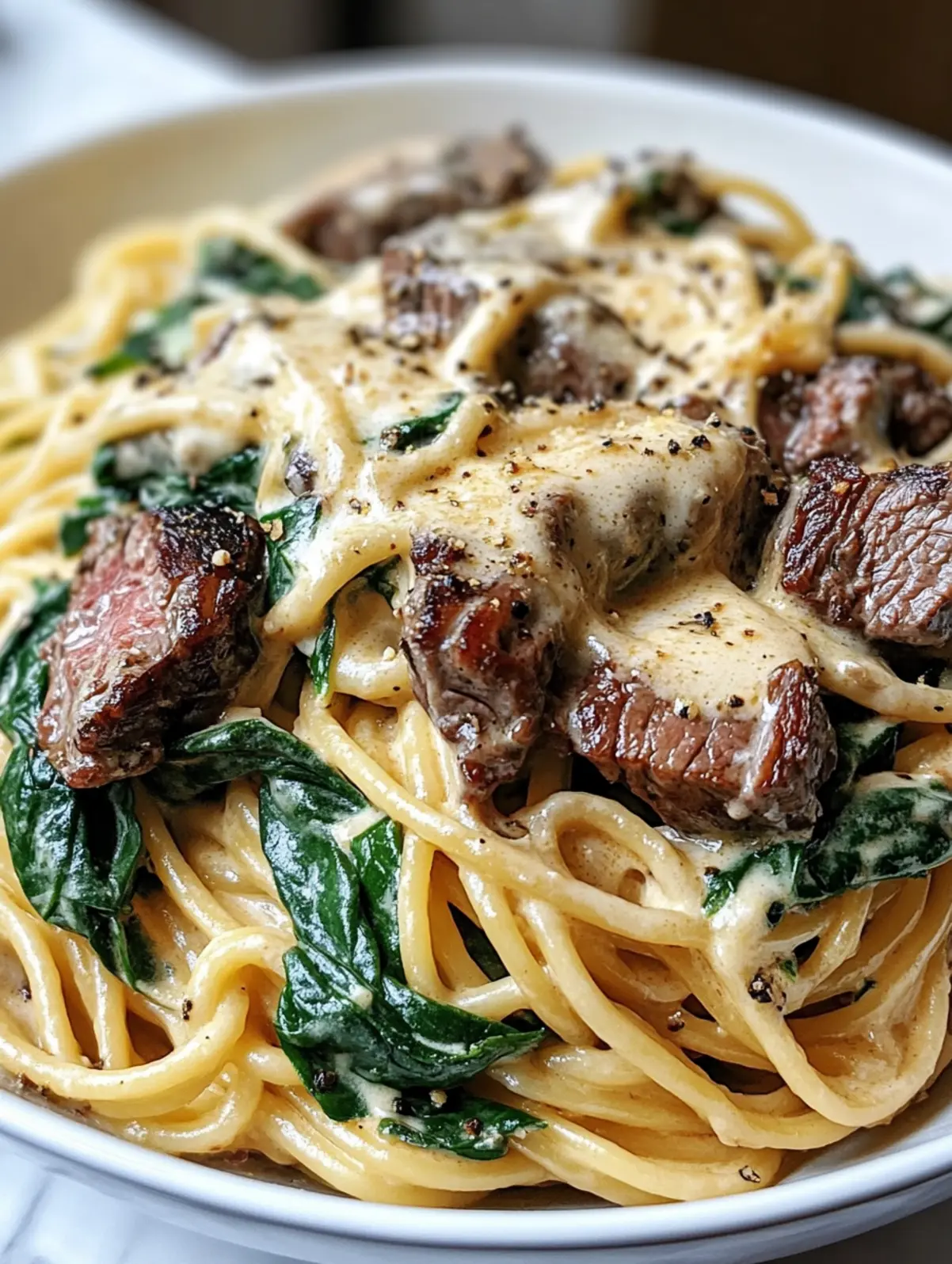 Irresistible Creamy Peppercorn Steak Spaghetti with Spinach